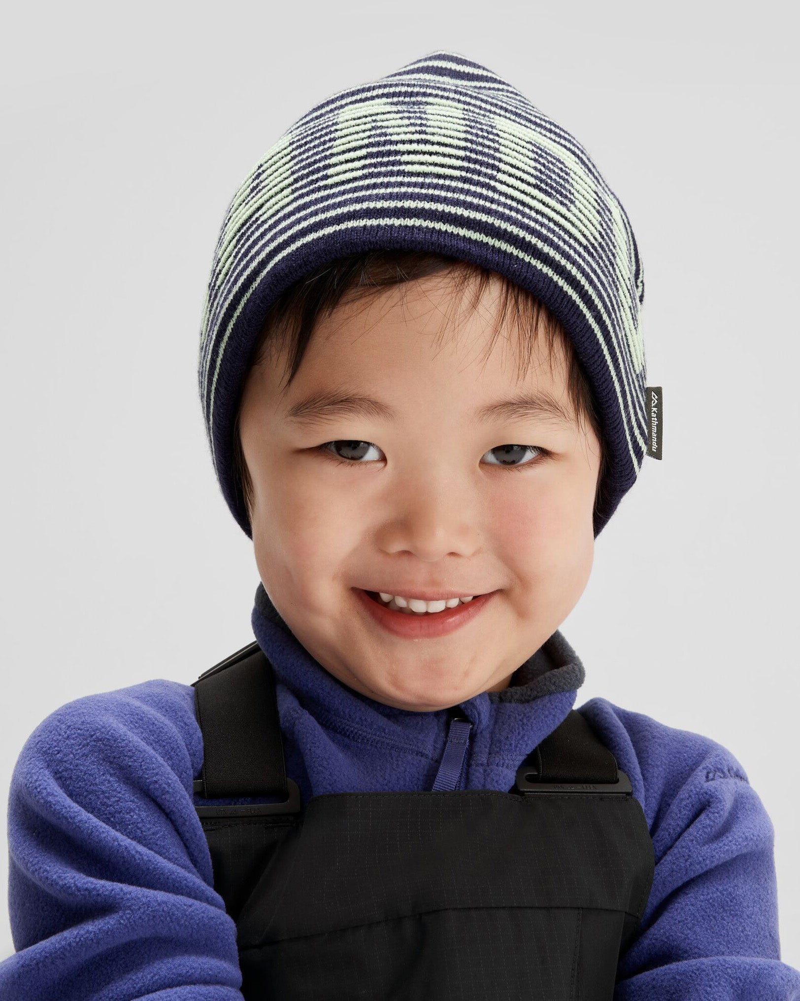 Kids' Poma Beanie - Glowy/Dark Horizon – Kathmandu NZ