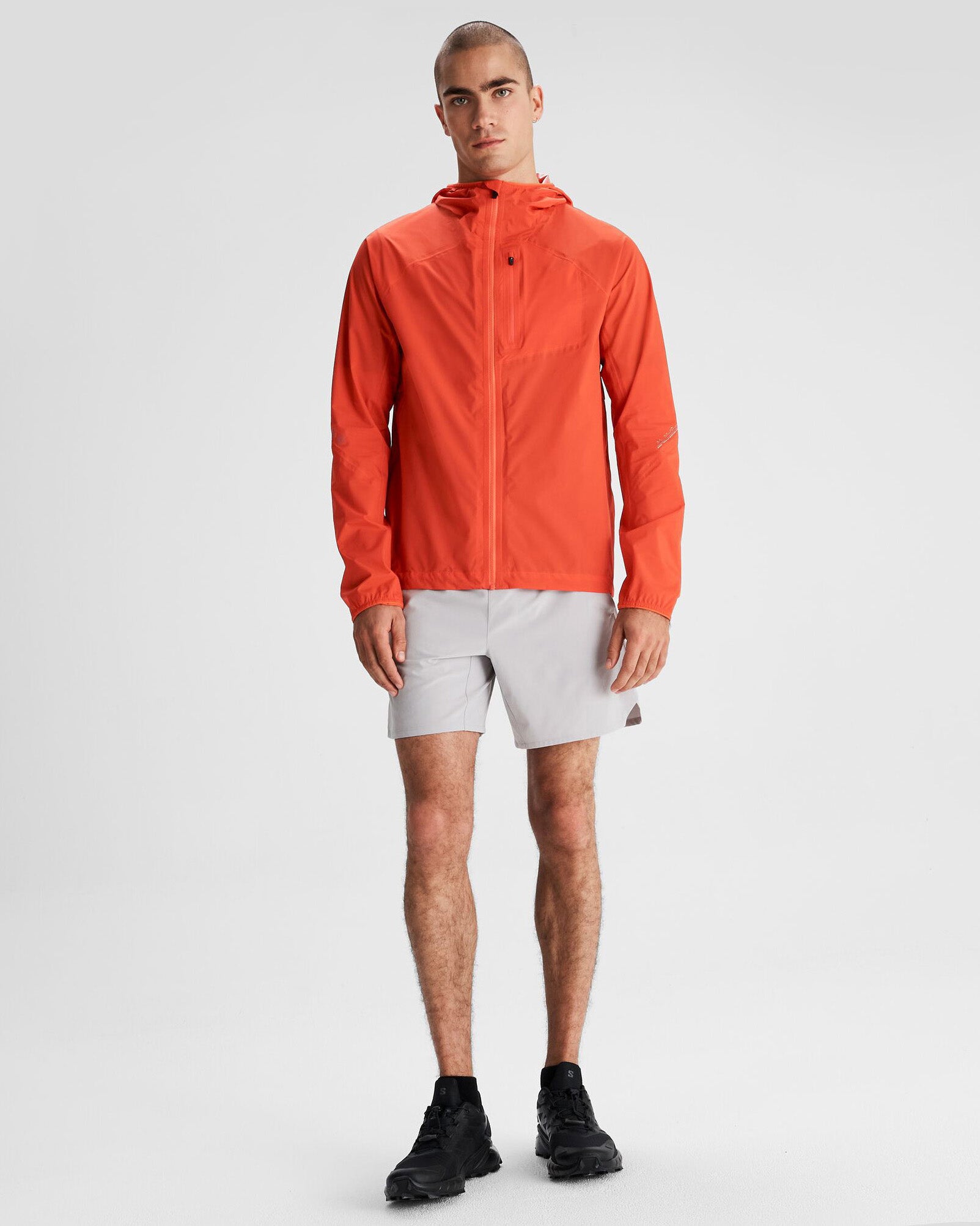 Men's Seeker 2.5L Rain Jacket - Hut Orange – Kathmandu NZ