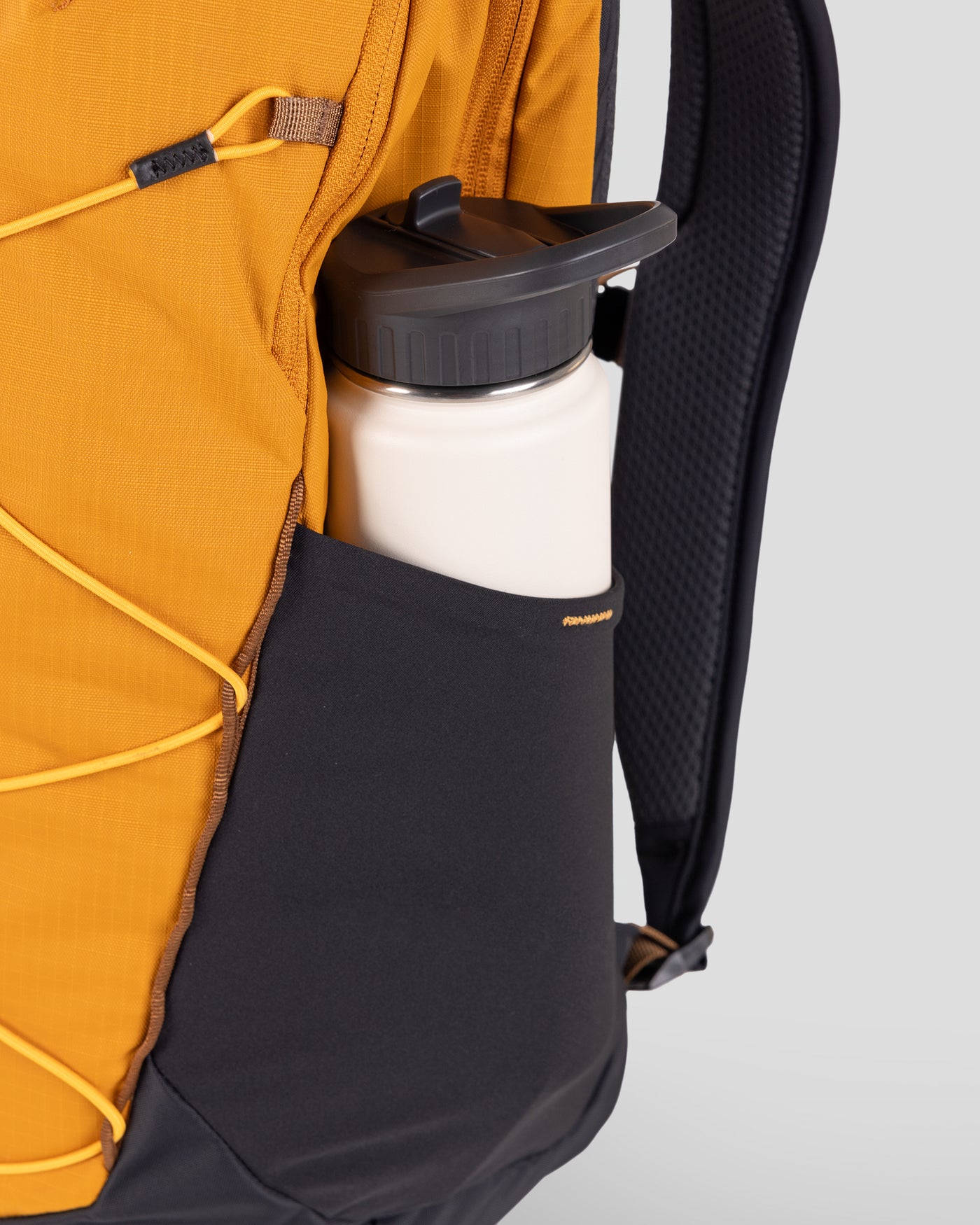 Axon Escape Backpack - 22L - Golden Oak/Stingray – Kathmandu NZ